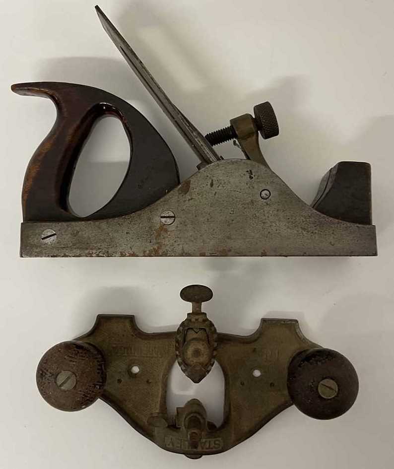 Lot 60 - A steel plane with mahogany infill and handle,