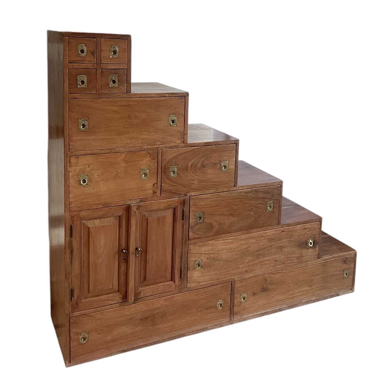 Lot 48 - A modern teak stepped wall unit, with six