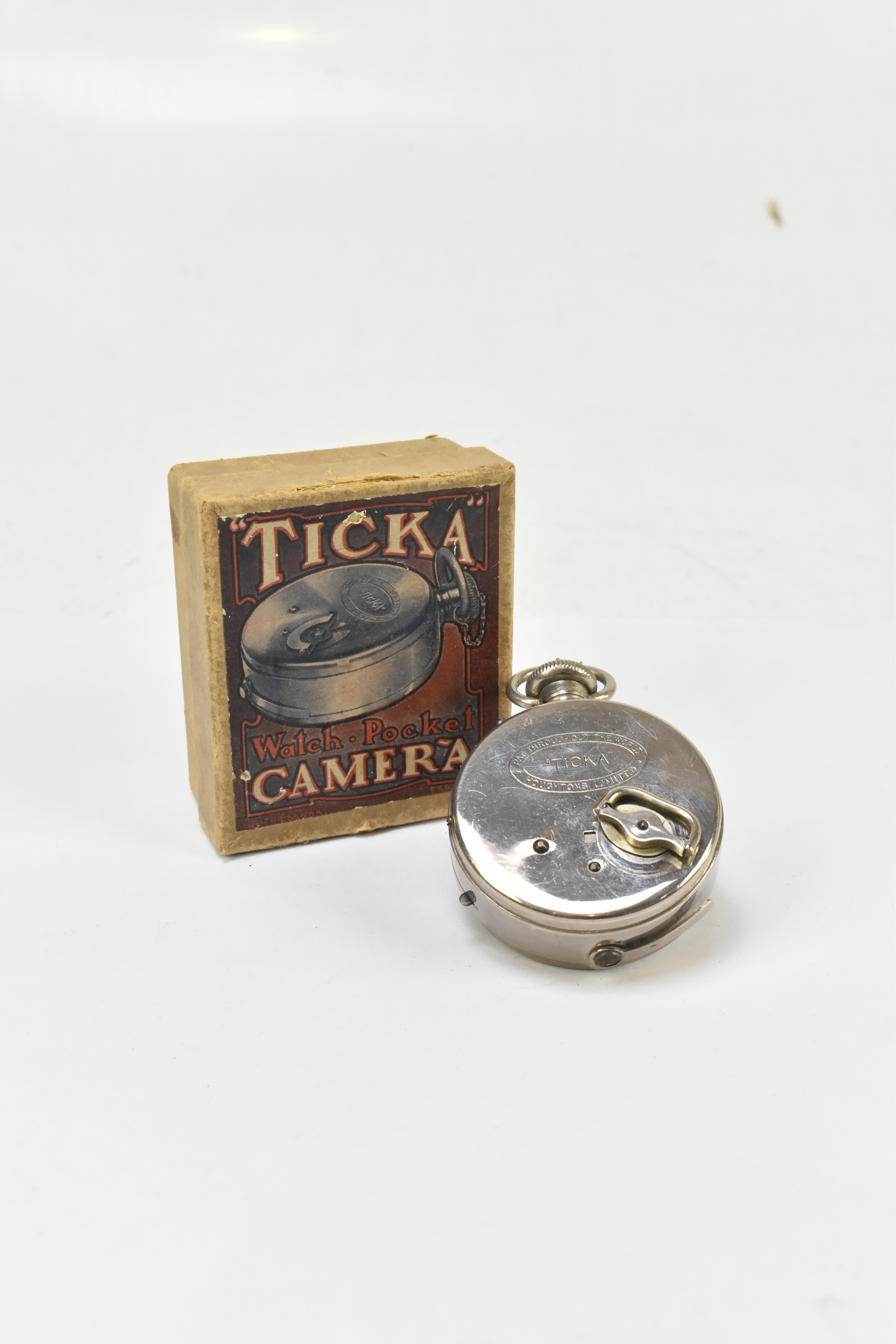 Lot 65 - TICKA; a chrome watch pocket camera
