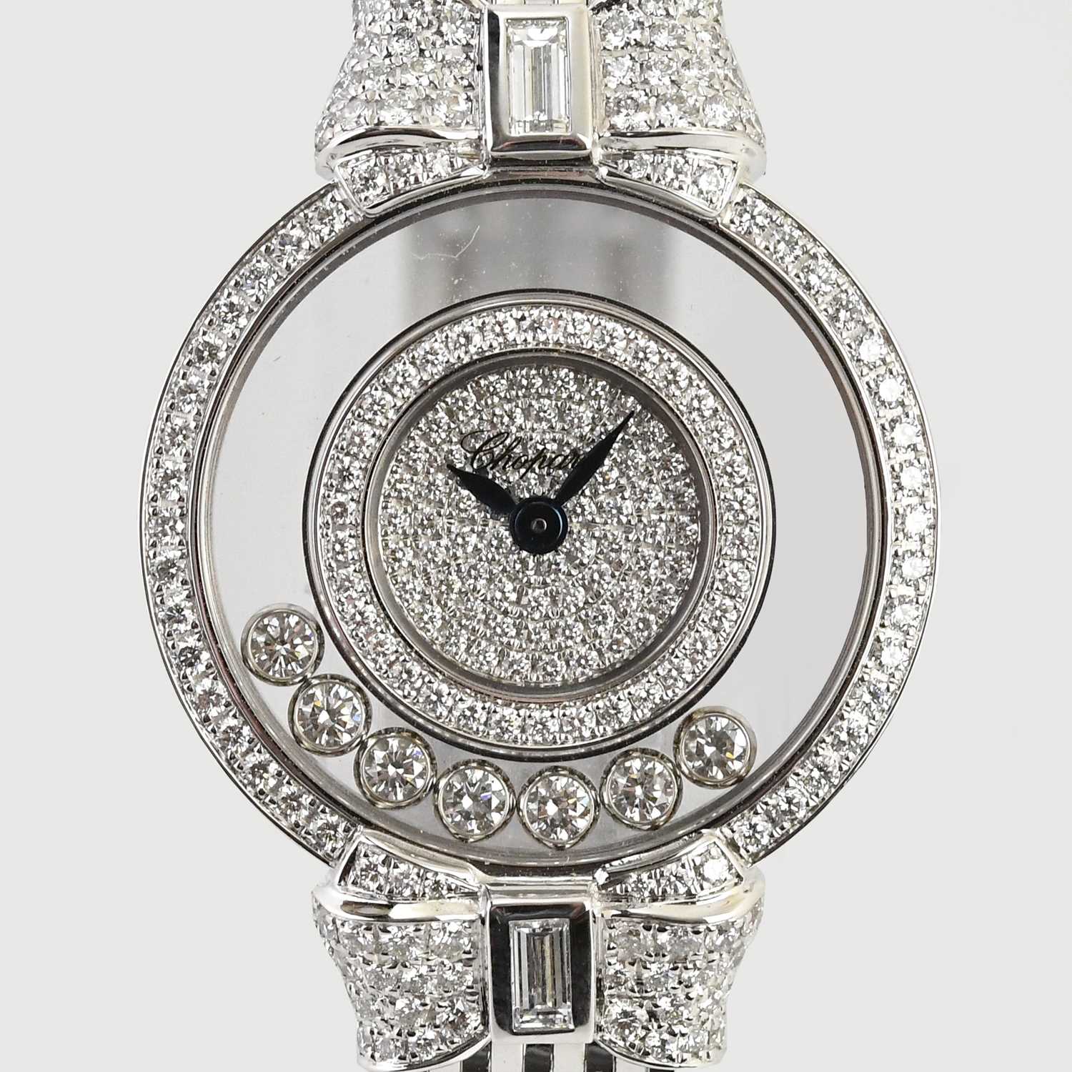 Lot 62 - CHOPARD; a lady's 18ct white gold 'Happy