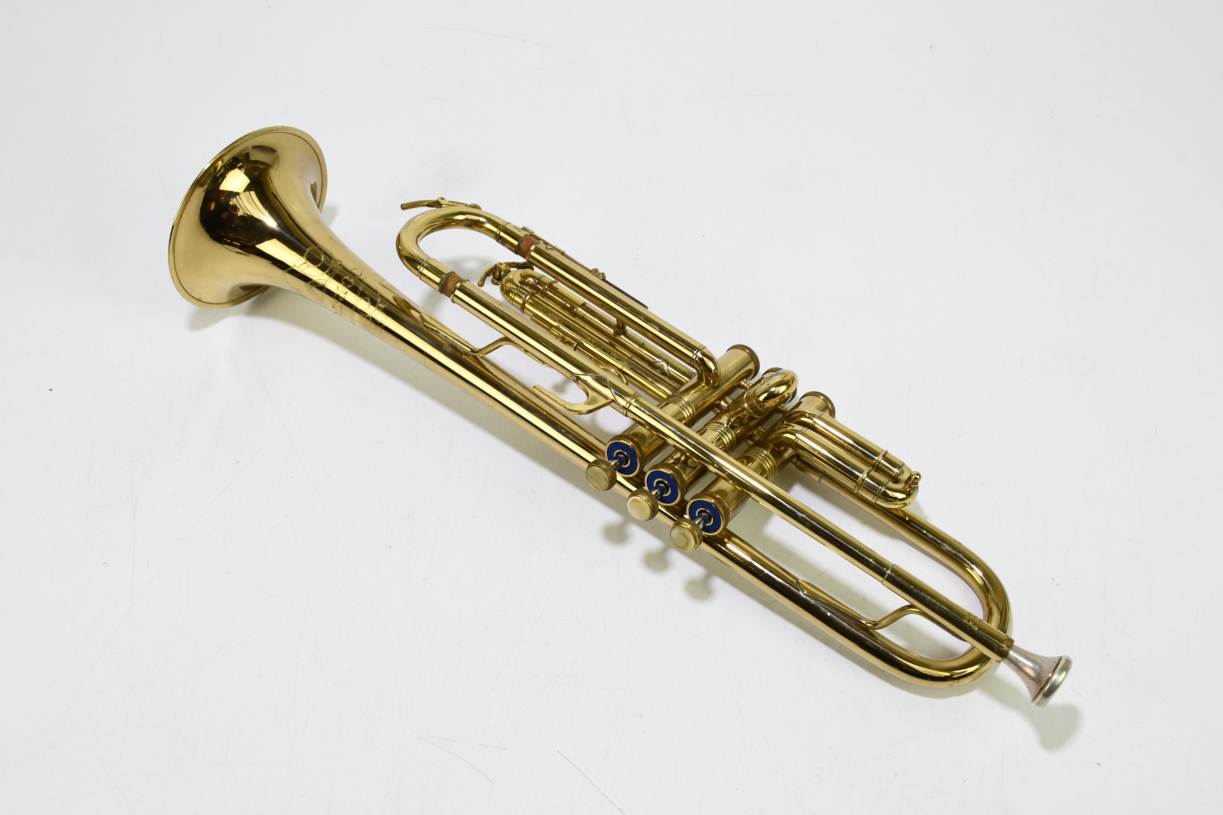 Lot 1082 - CORTON; a cased trumpet.