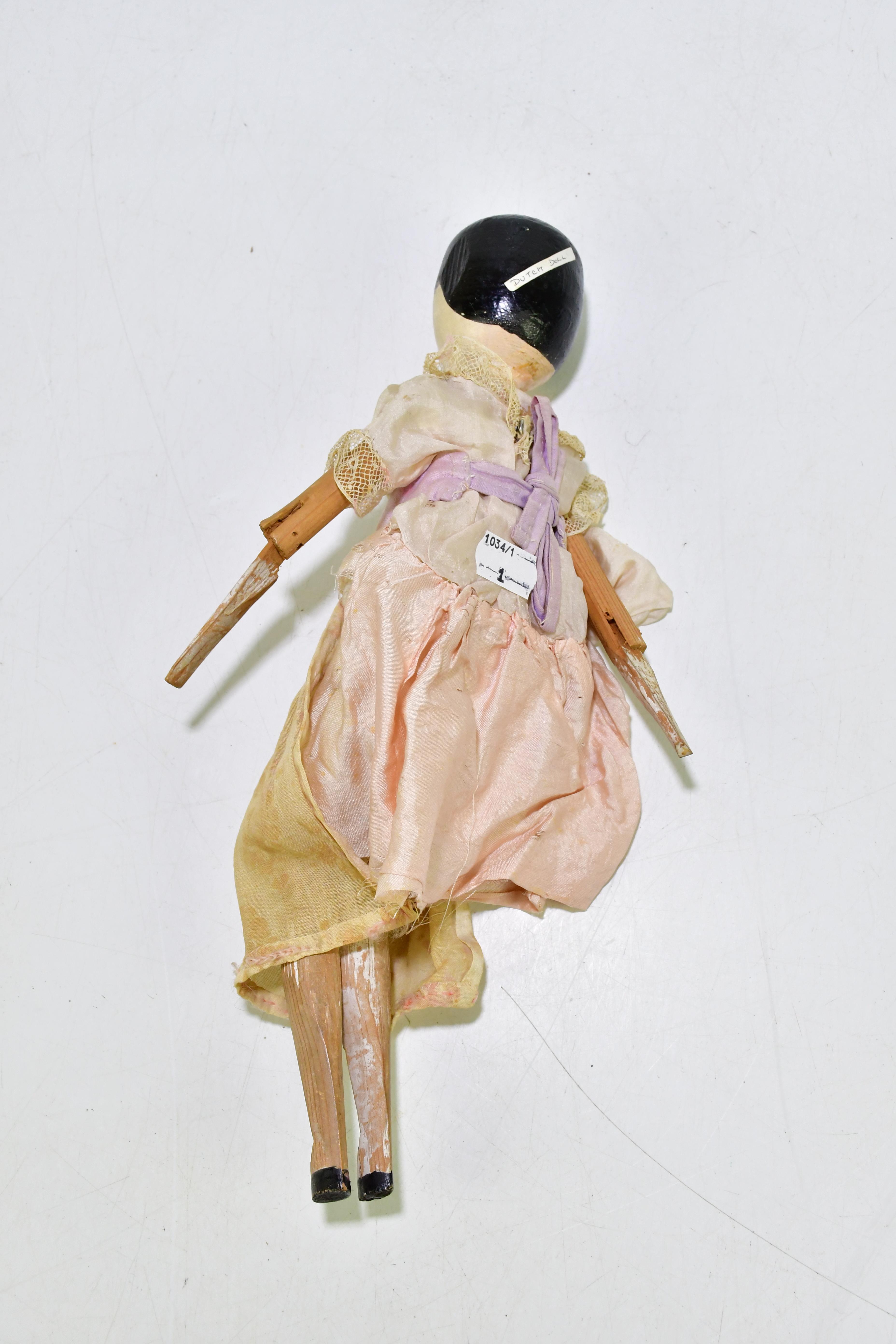 Lot 240 - A 19th century Dutch peg doll with
