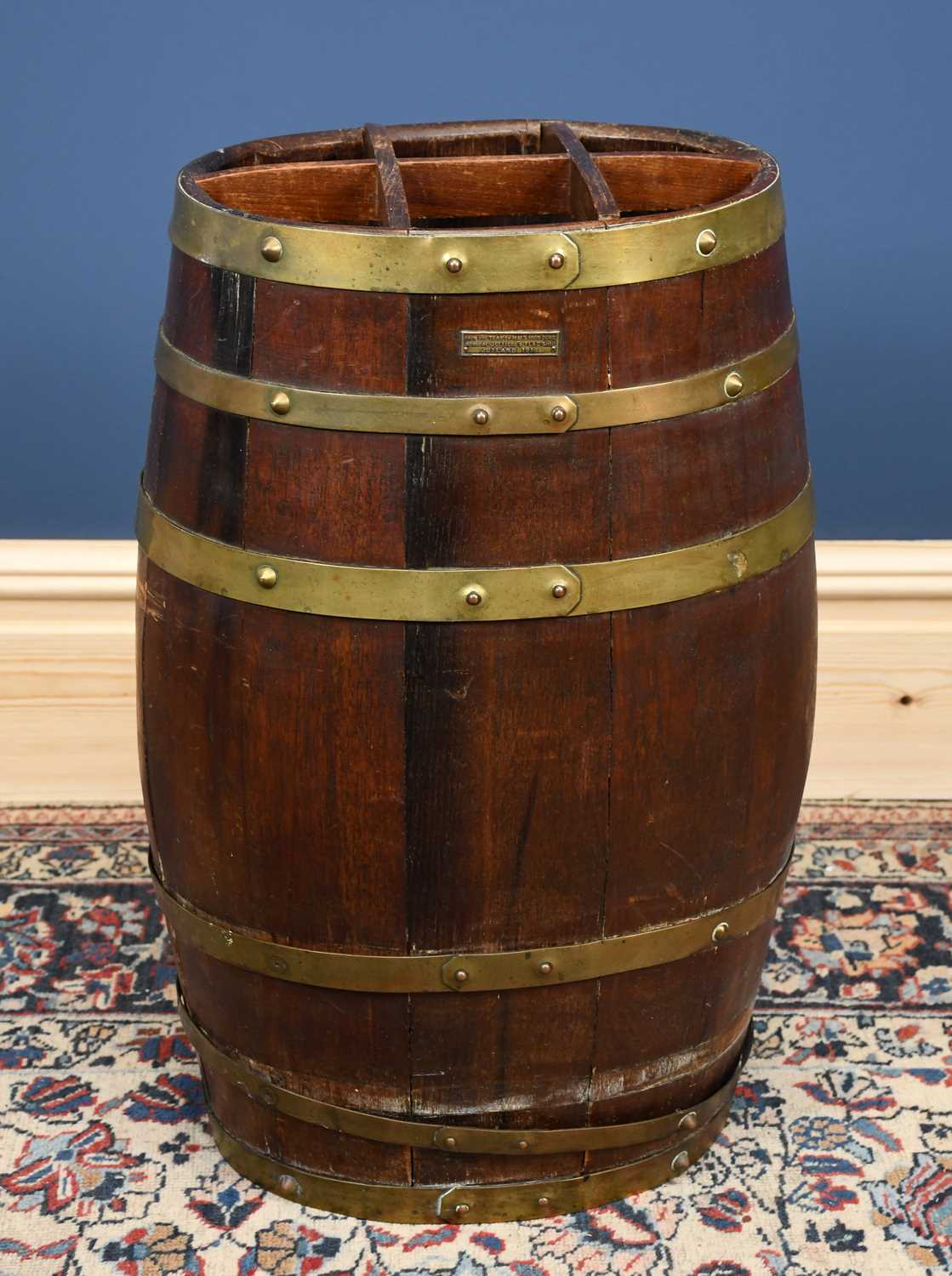 Lot 2818 - A brass bound teak barrel shaped stick