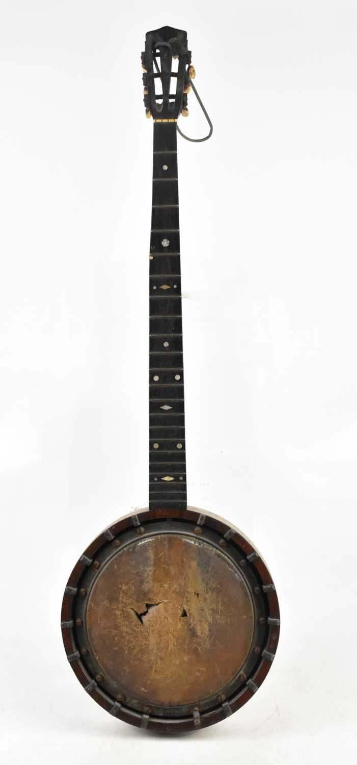 Lot 254 - A vintage banjo with inlaid back (in need of