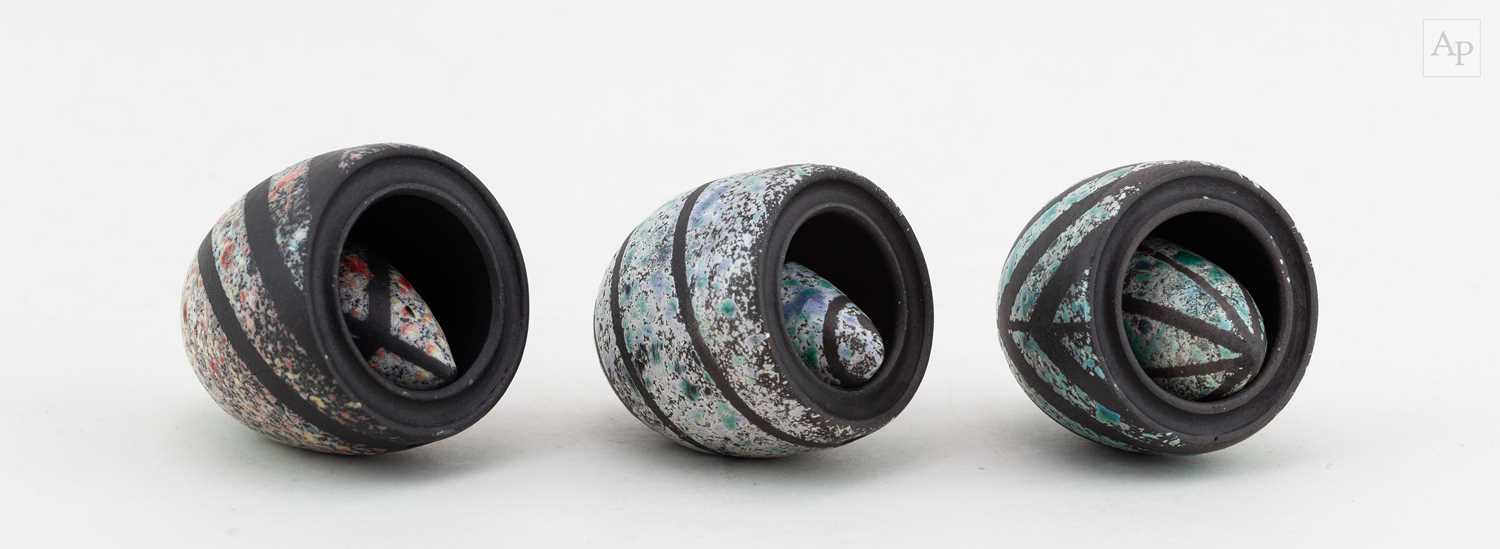 Lot 213 - ERIC MOSS (born 1959); a trio of raku mini