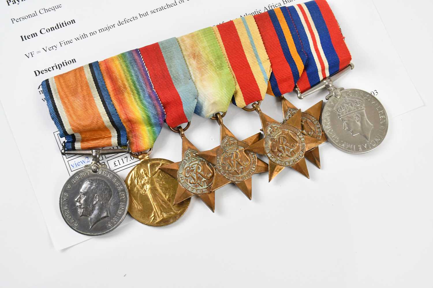 Lot 176 - A WWI and WWII seven piece medal group,