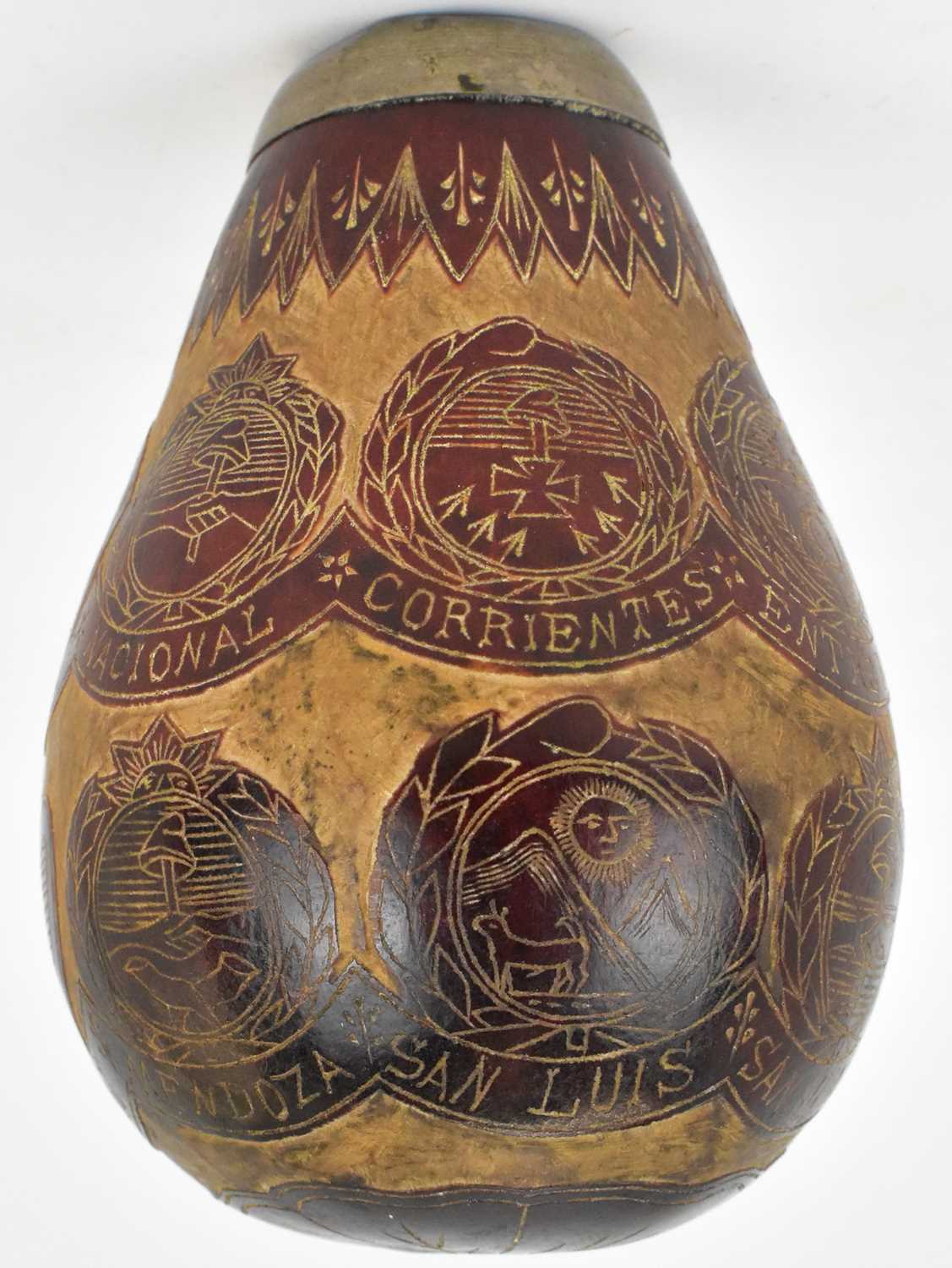 Lot 192 - A 19th century carved coquilla nut, the body