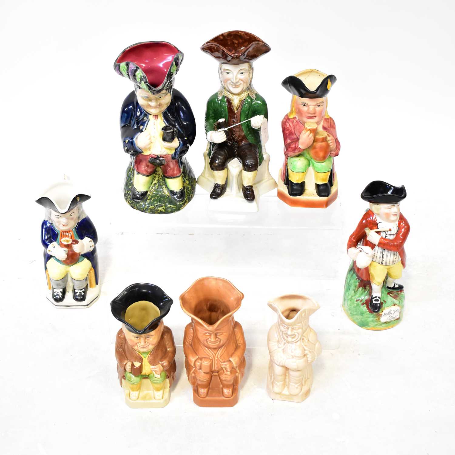 Lot 195 - Eight vintage and antique Toby jugs, height