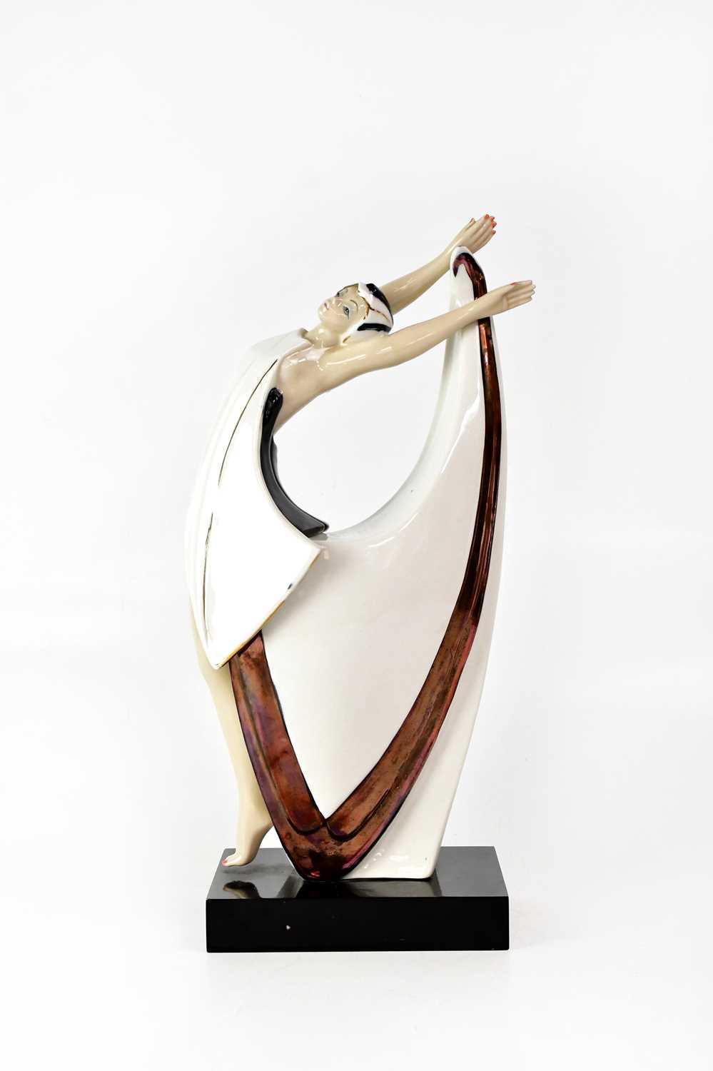 Lot 216 - An Art Deco style ceramic figure of a dancer,