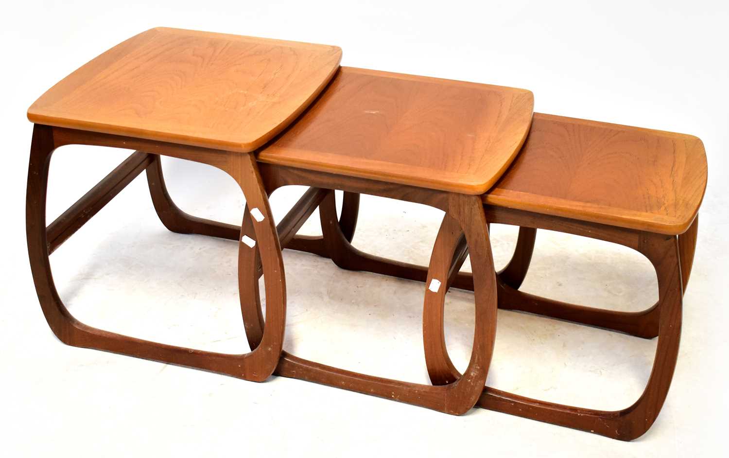 Lot 11 - NATHAN; a teak crossbanded nest of three