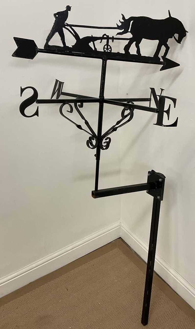 Lot 175 - A metalwork weather vane, with top featuring