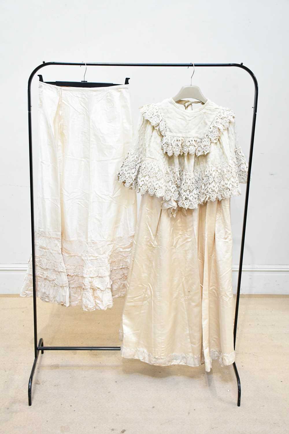Lot 788 - ELIZABETH EMANUEL; a vintage cream shot silk