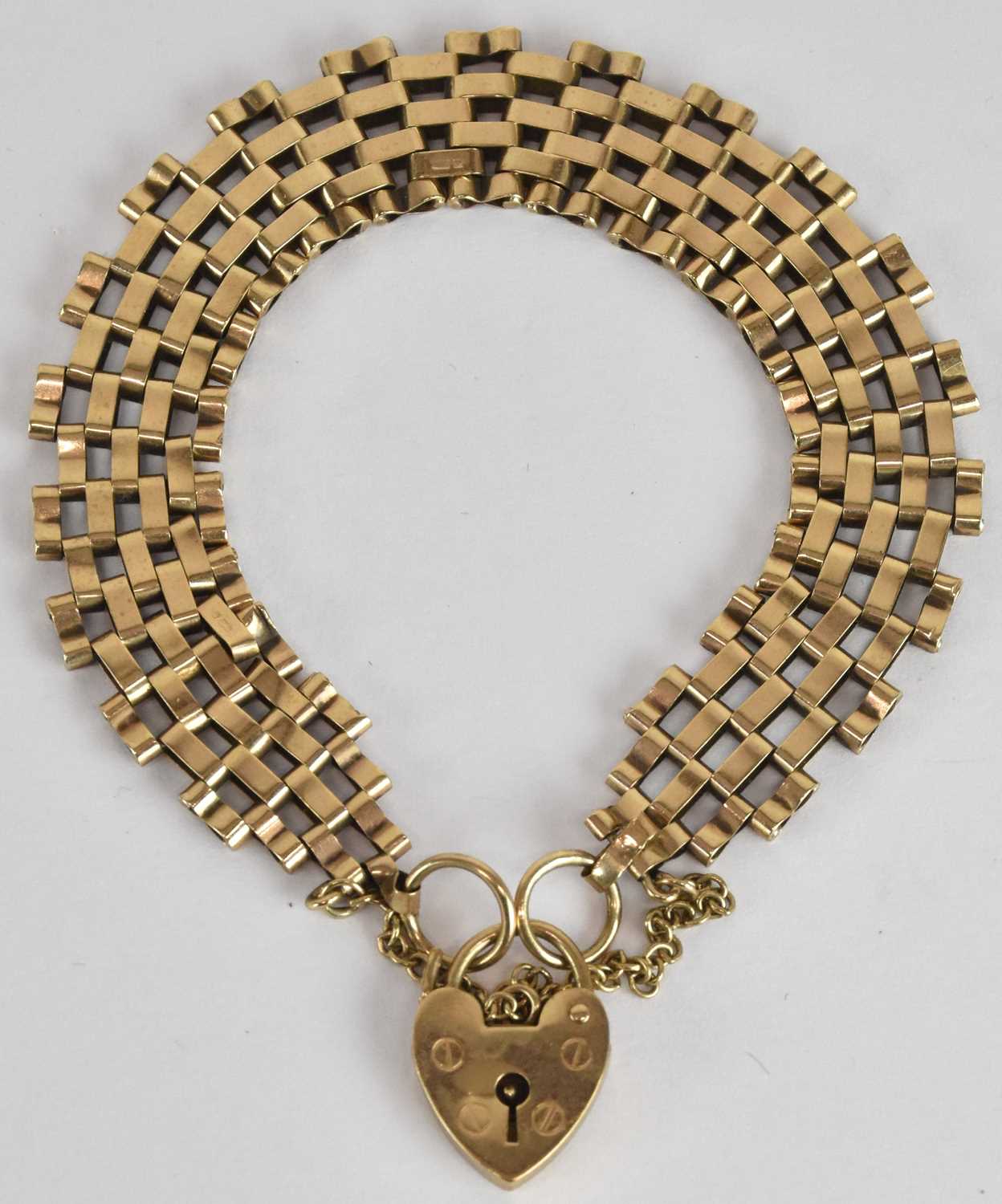 Lot 1594 - A 9ct yellow gold gate link bracelet, with