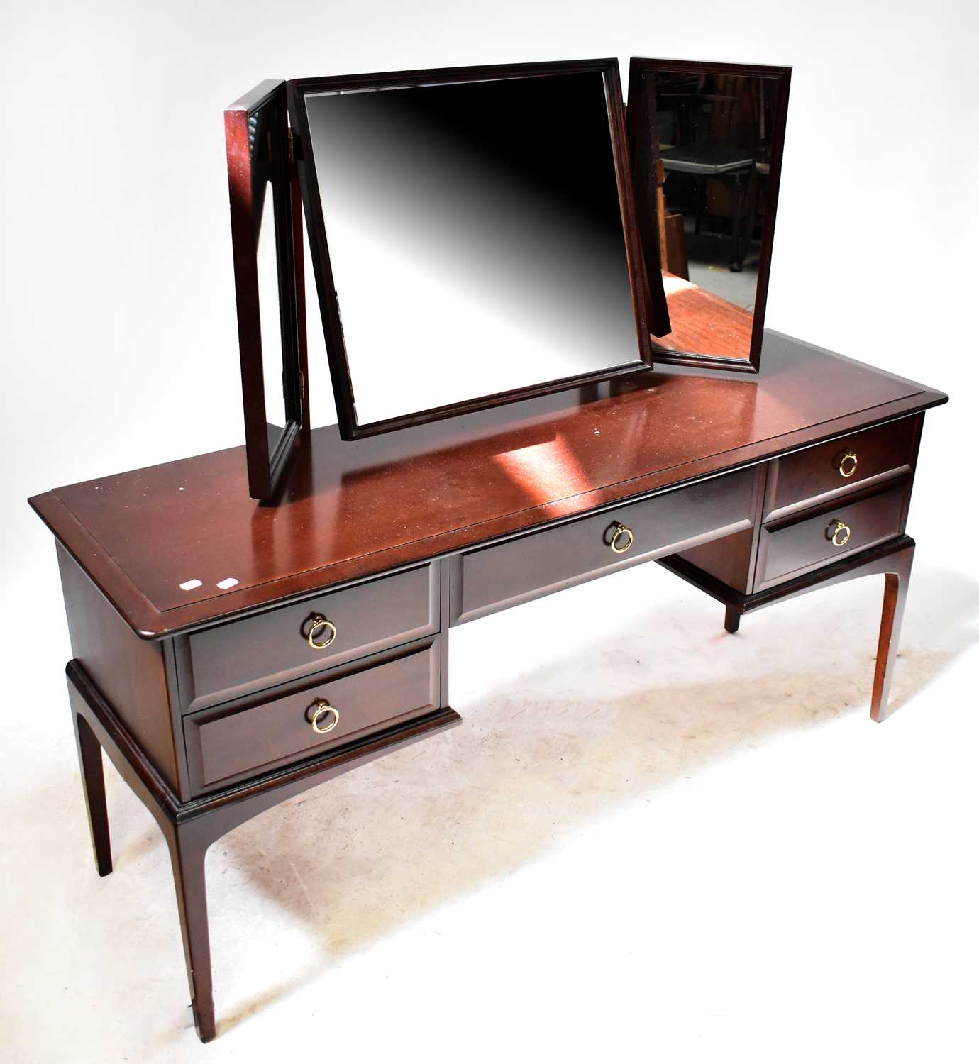 Lot 76 - A Stag Minstrel dressing table, with triptych