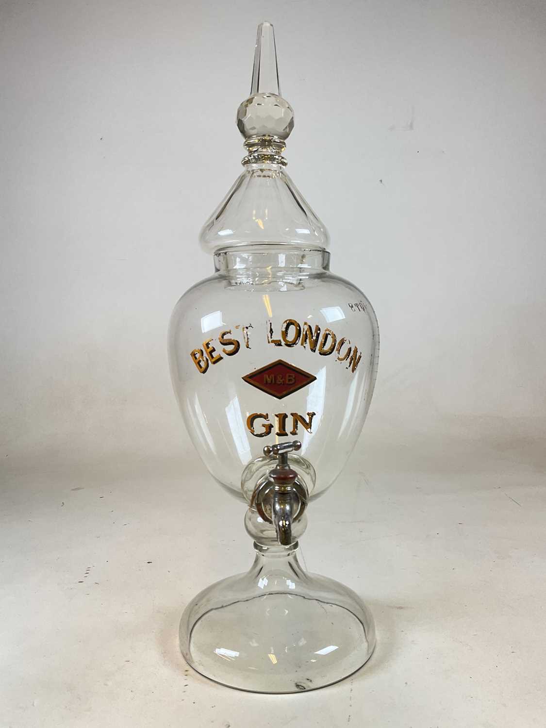 Lot 105 - A large advertising clear glass gin