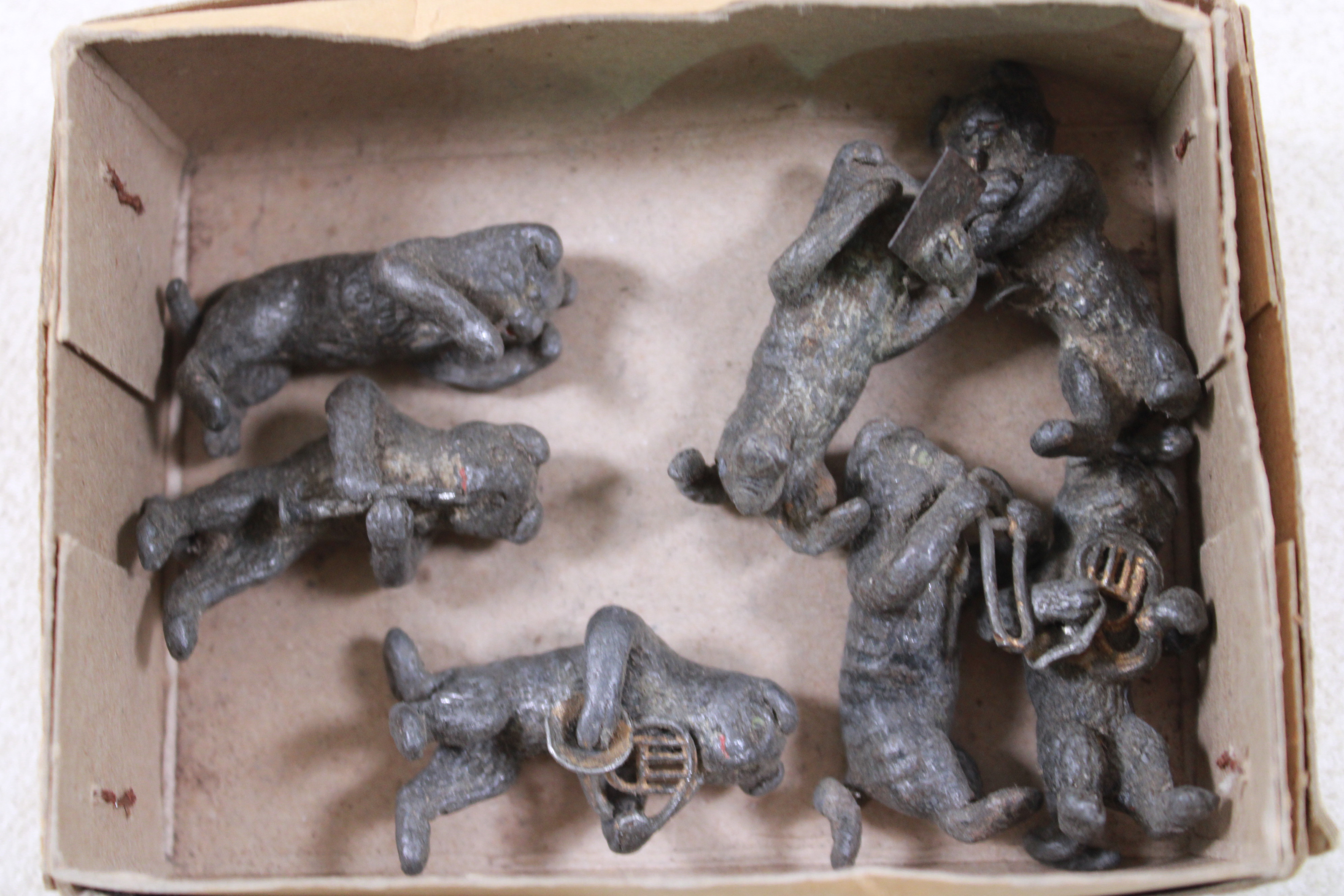 Lot 1070 - An early 20th century seven piece miniature