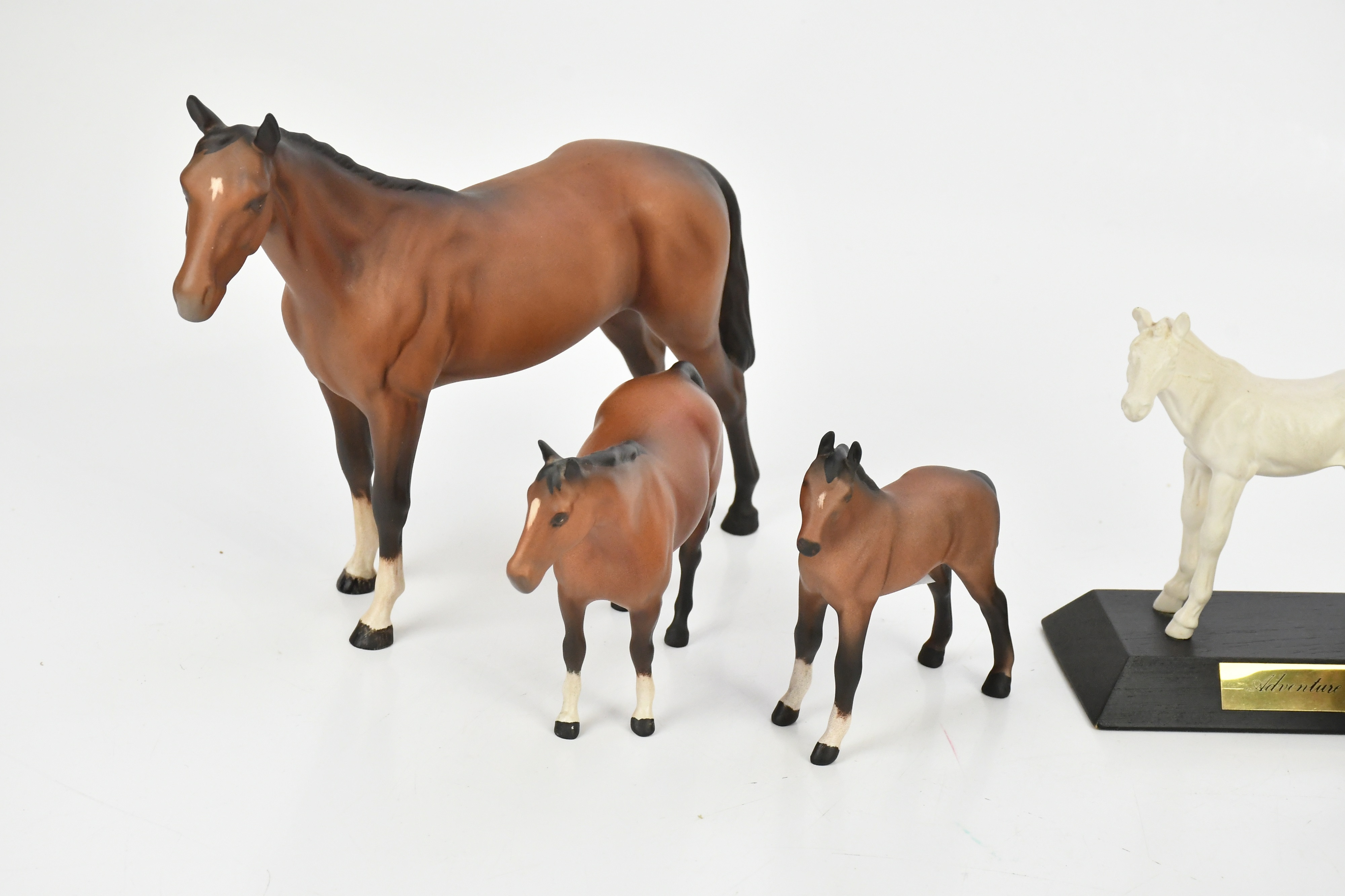 Lot 2497 - BESWICK; five models of horses and foals,