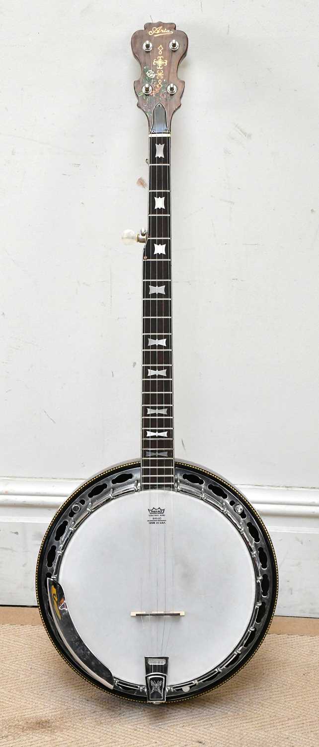 Lot 1051 - ARIA; a Bowtie five string banjo, with hand