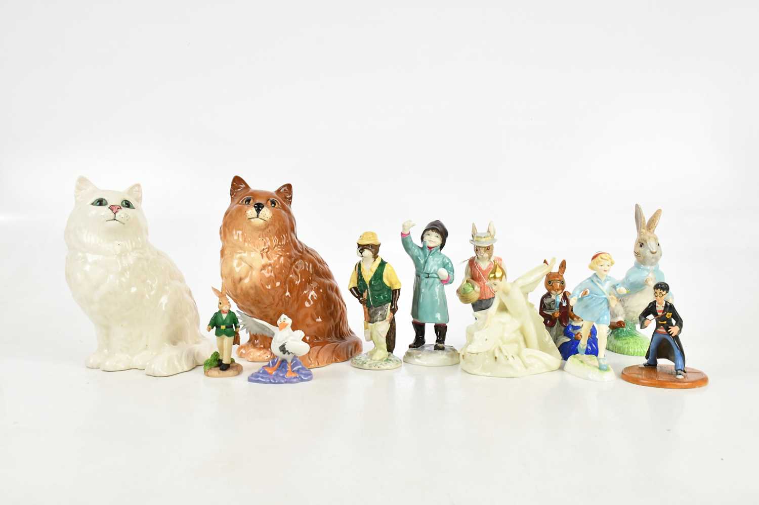 Lot 154 - BESWICK; two models of cats, numbered
