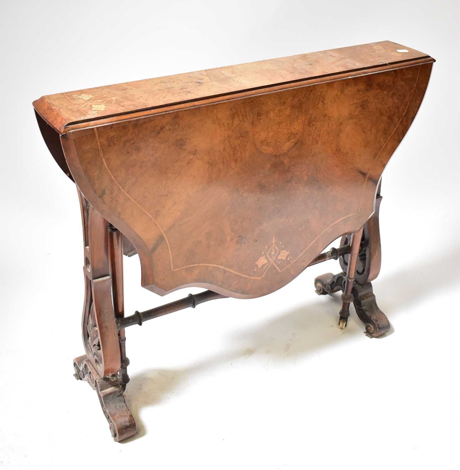 Lot 27 - A Victorian inlaid walnut Sutherland table