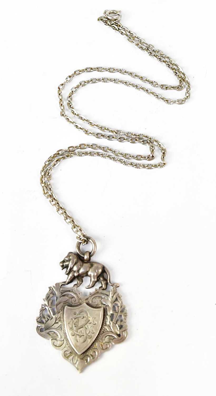Lot 1164 - A hallmarked silver pocket watch fob, with