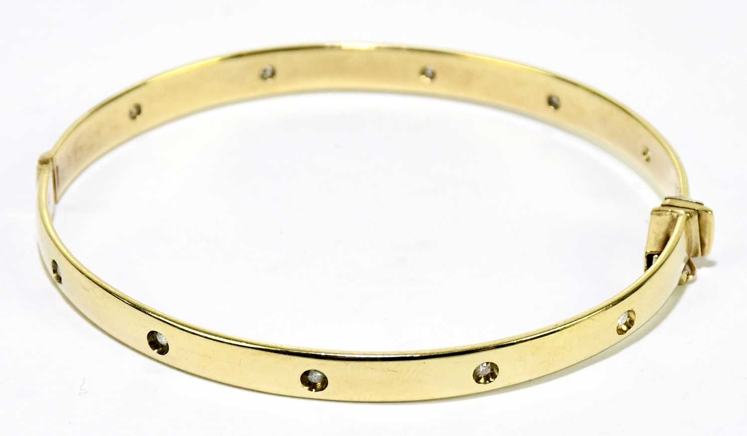 Lot 1286 - A 9ct yellow gold bracelet later set with