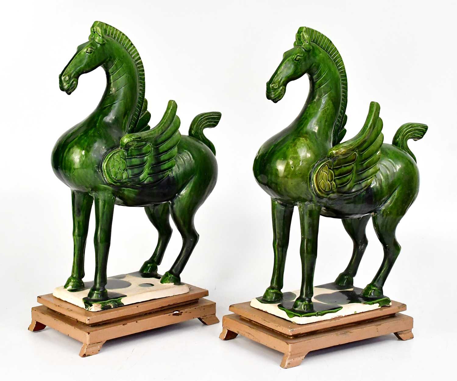 Lot 175 - A pair of mid-20th century green glazed Tang