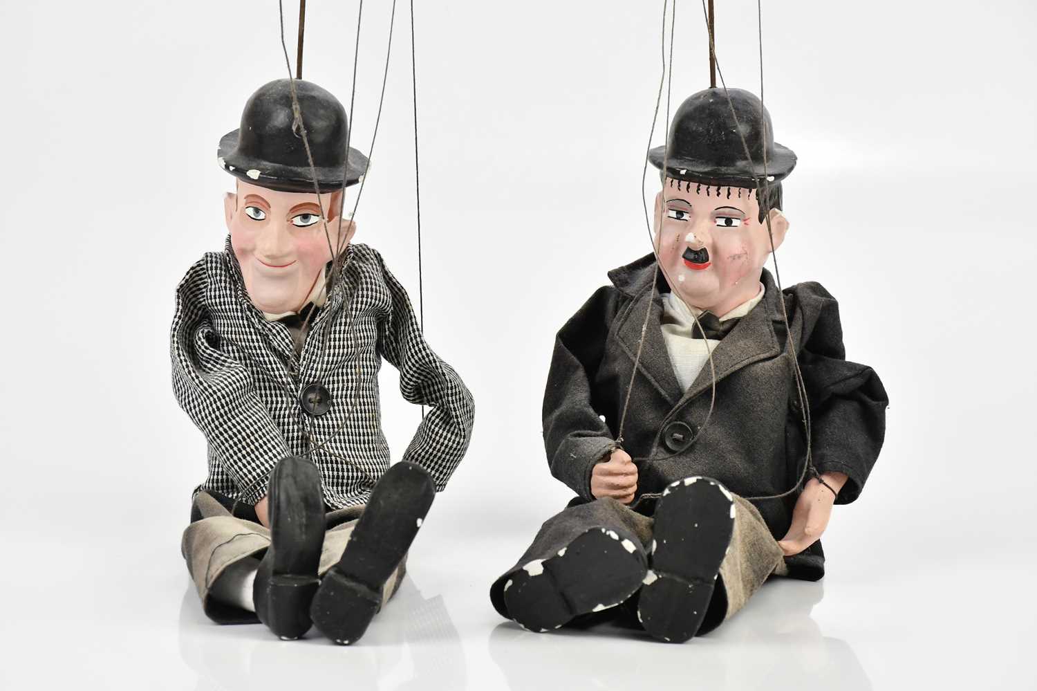 Lot 2091 - Two 1950s Laurel and Hardy puppets, overall