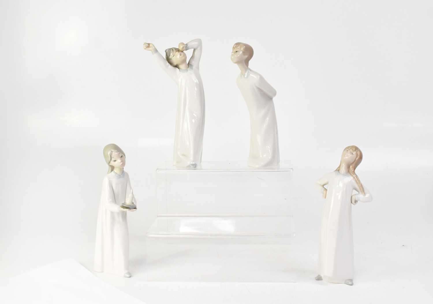 Lot 166 - LLADRÓ; four Lladrό figures of children in