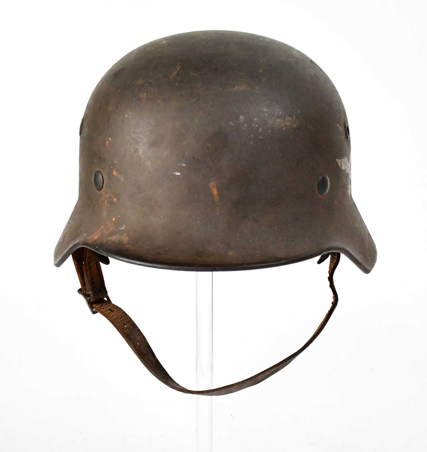 Lot 506 - A WWII German M42 steel helmet with folded