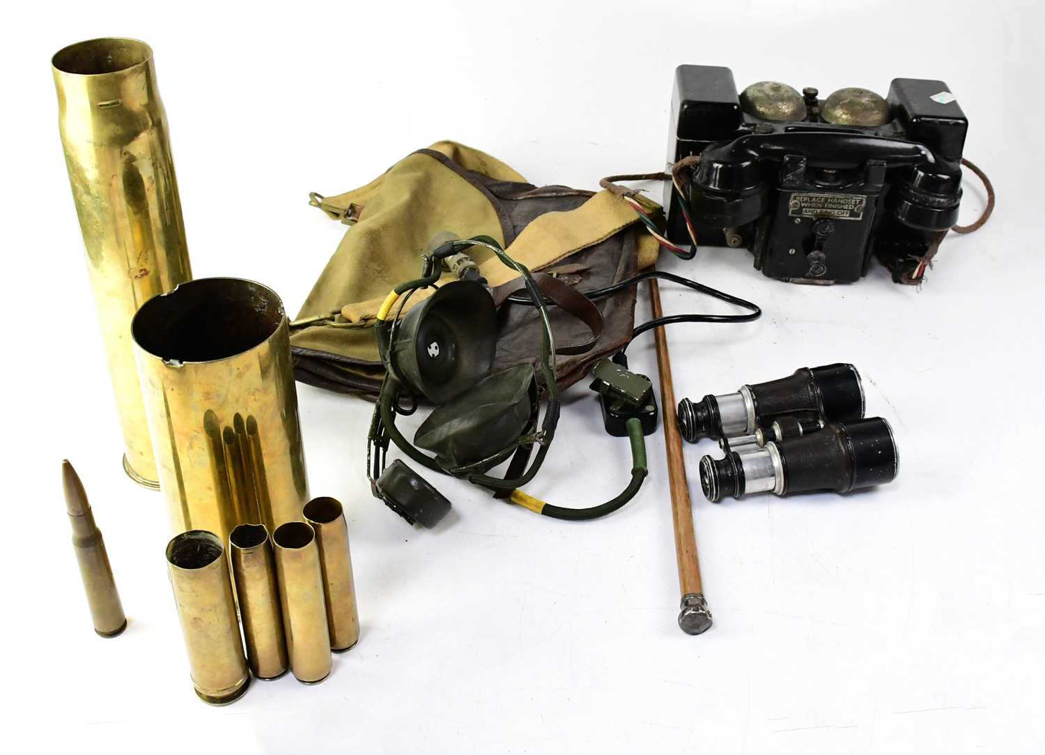 Lot 549 - A WWII black field telephone M.II, a headset,