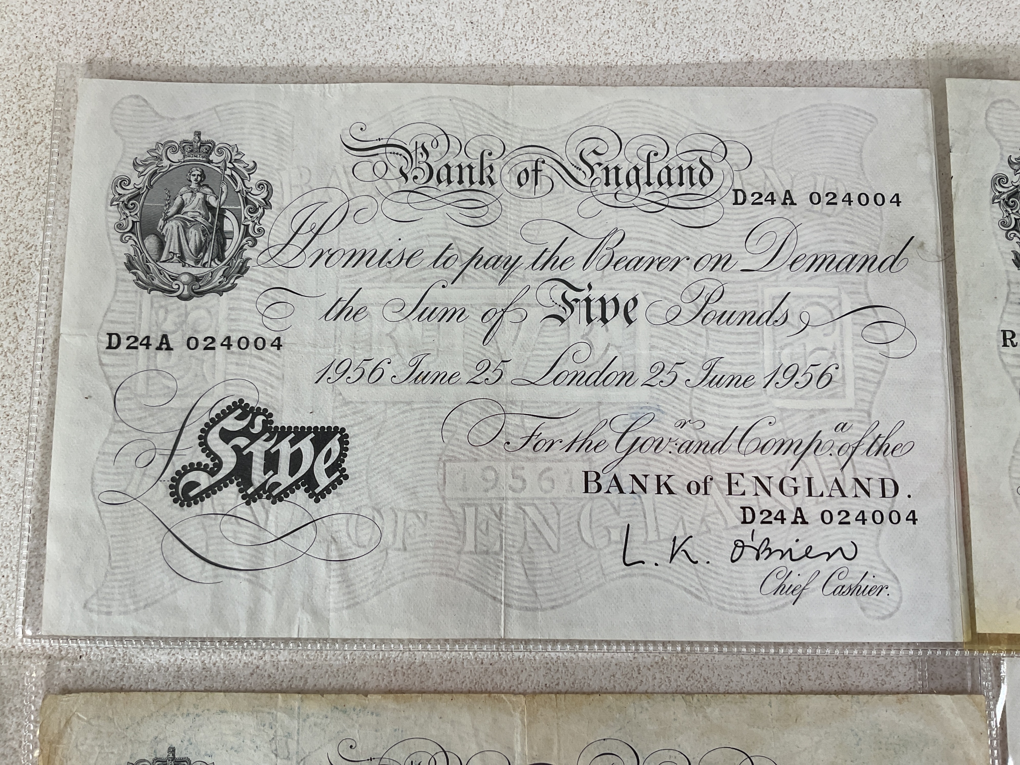 Lot 631 - Five white £5 pound notes, comprising 1947