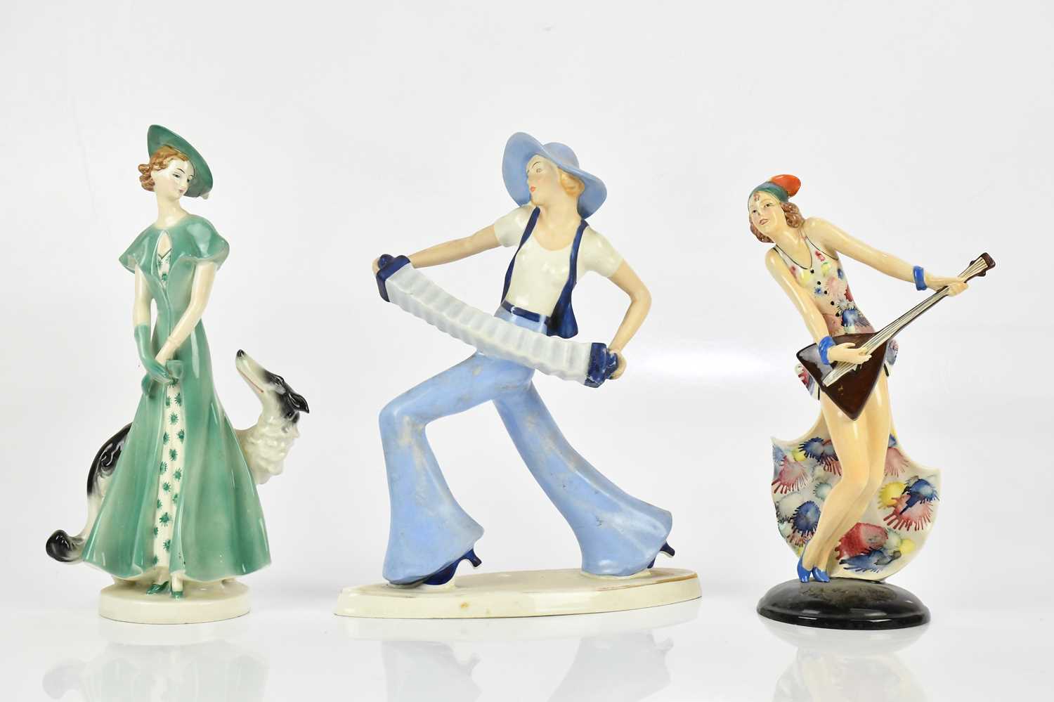 Lot 519 - GOEBEL; an Art Deco figure of a standing