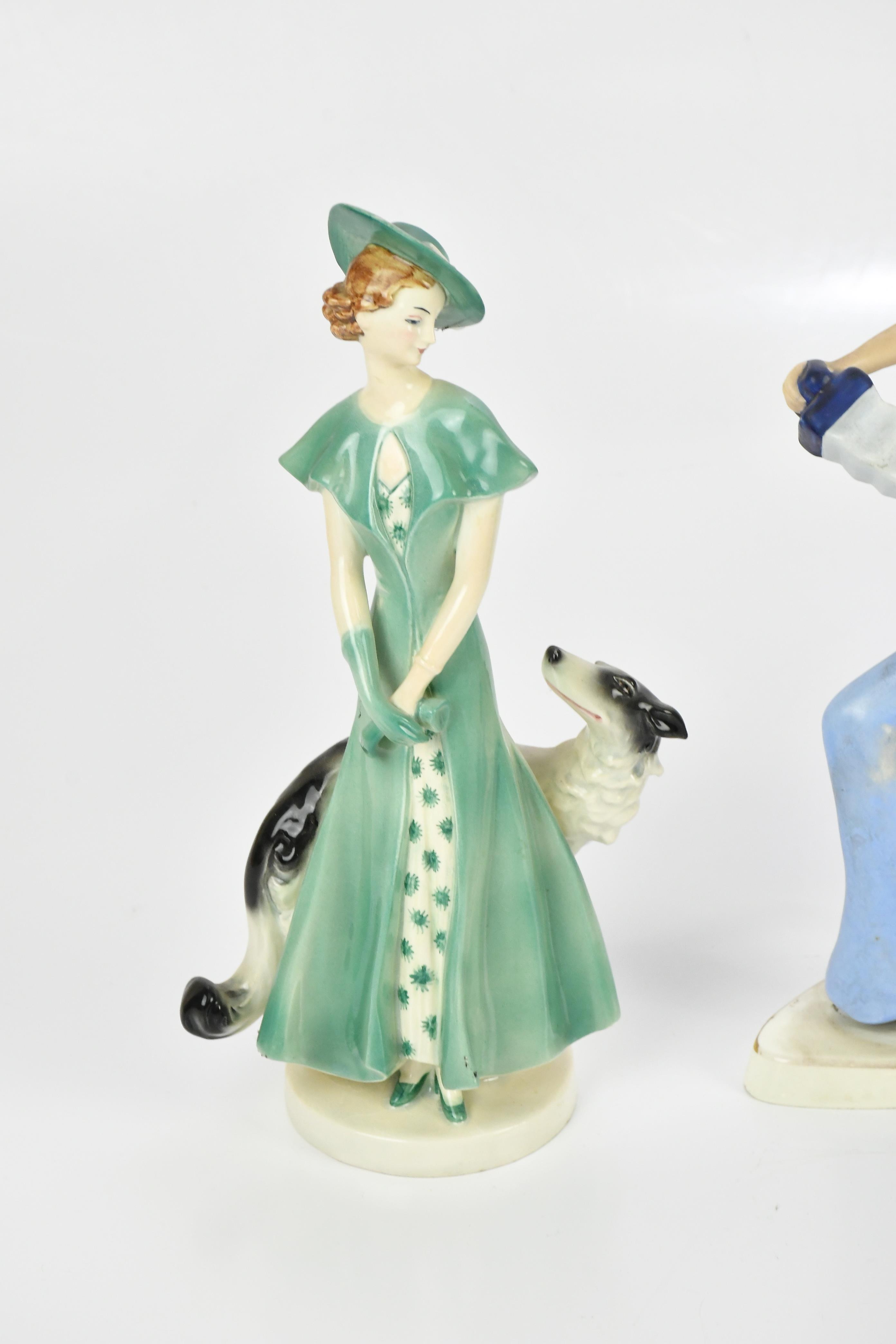 Lot 519 - GOEBEL; an Art Deco figure of a standing