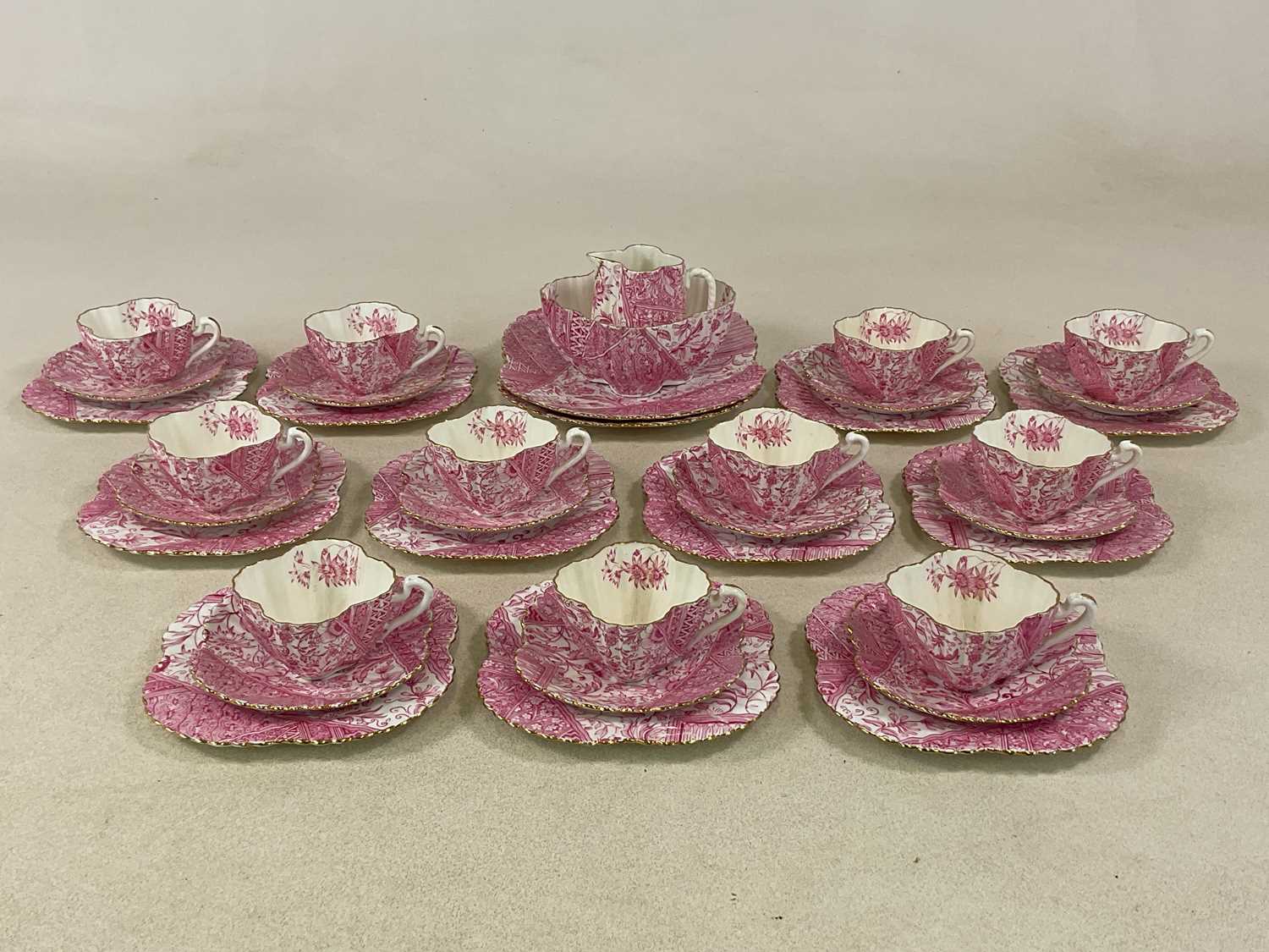 Lot 273 - WILEMAN & CO; a pink floral decorated part