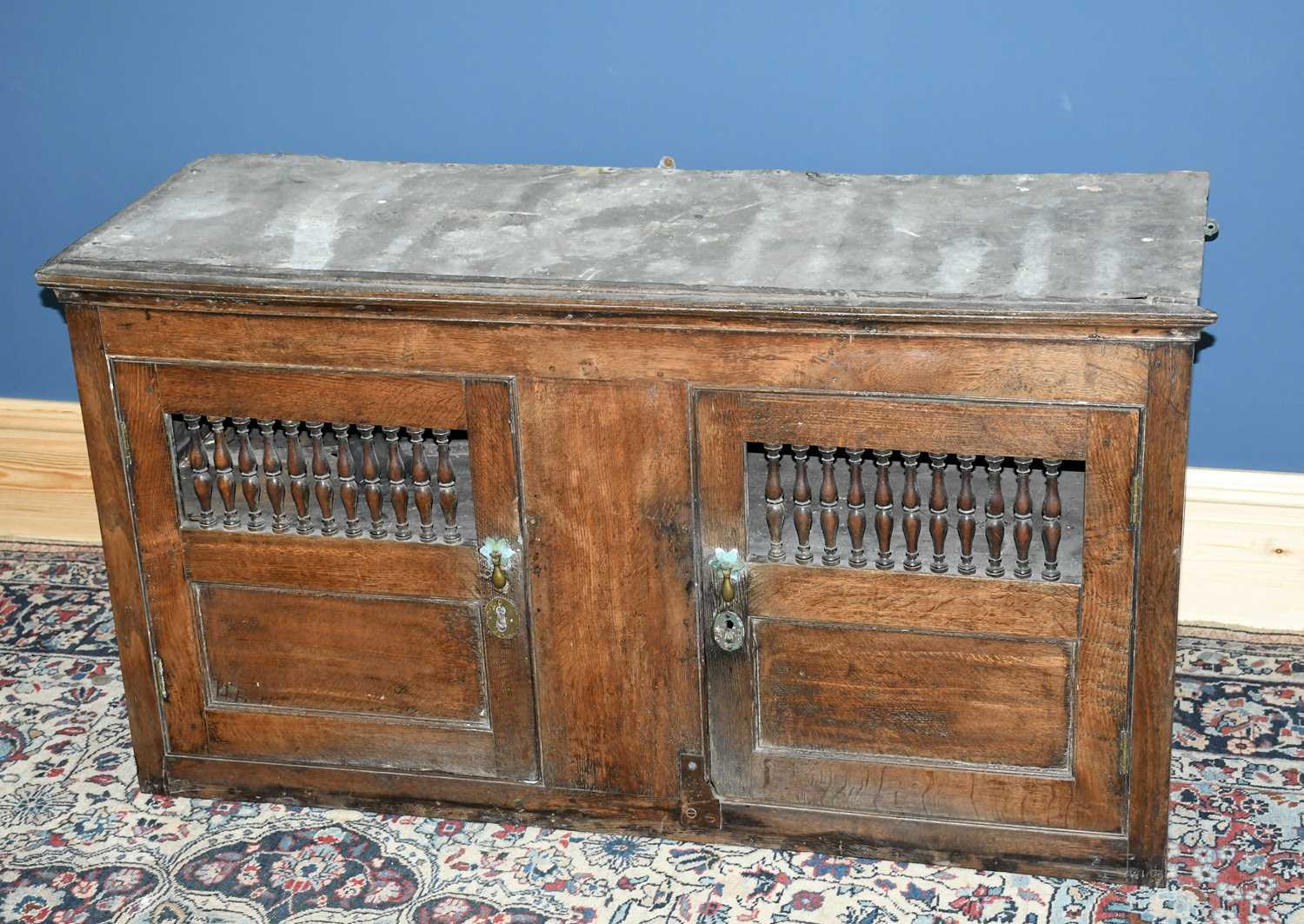 Lot 2976 - An 18th century vernacular oak food hutch,