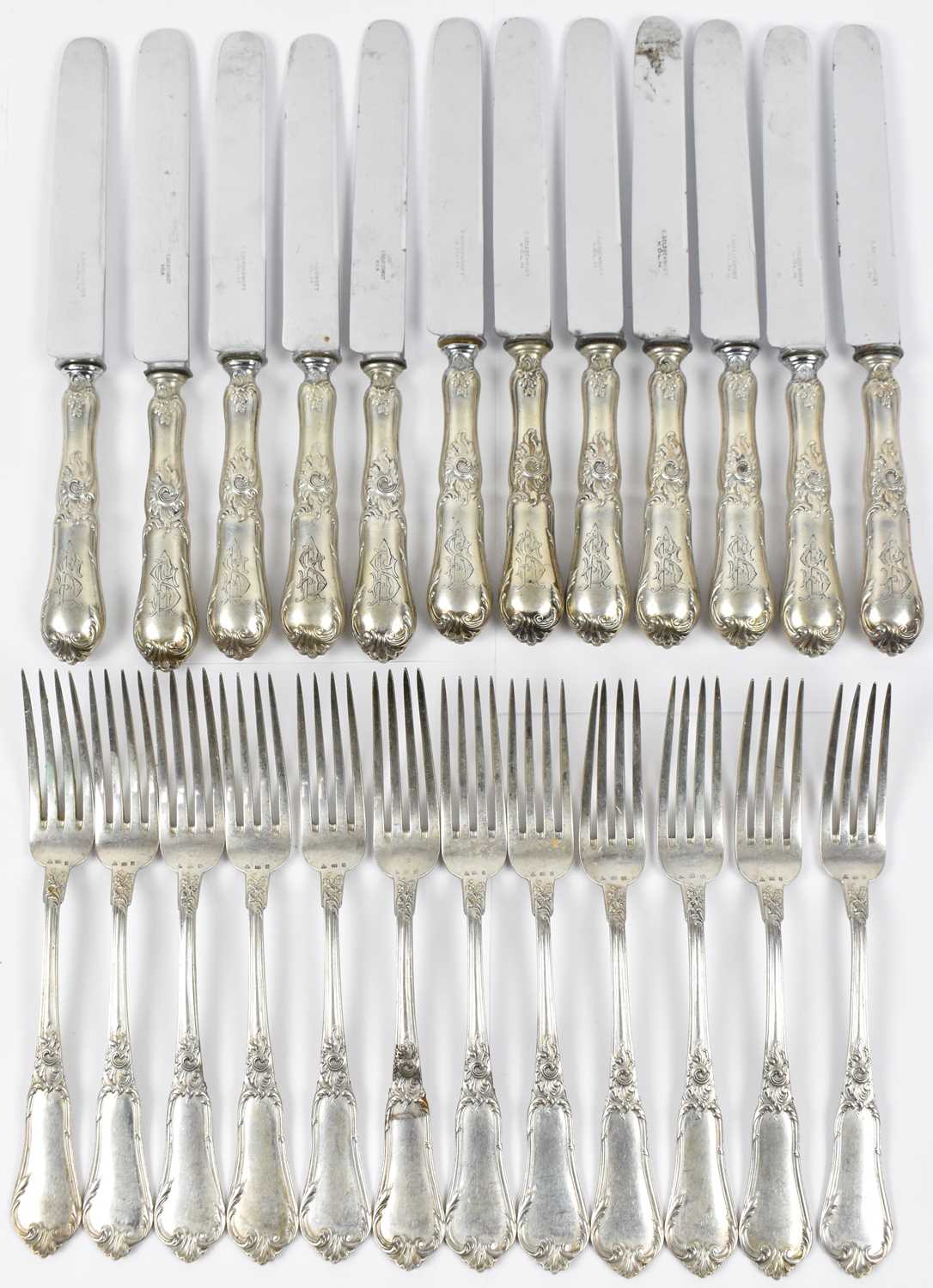 Lot 432 - A set of twelve 800 grade silver forks, and