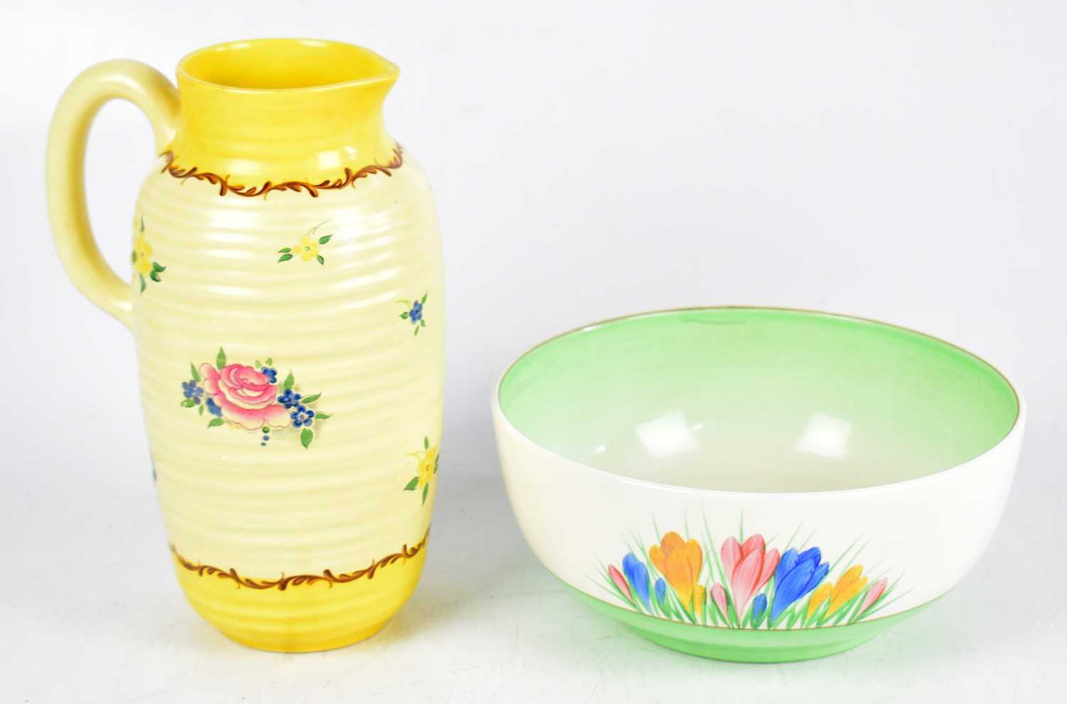 Lot 371 - CLARICE CLIFF; a ribbed jug decorated in the