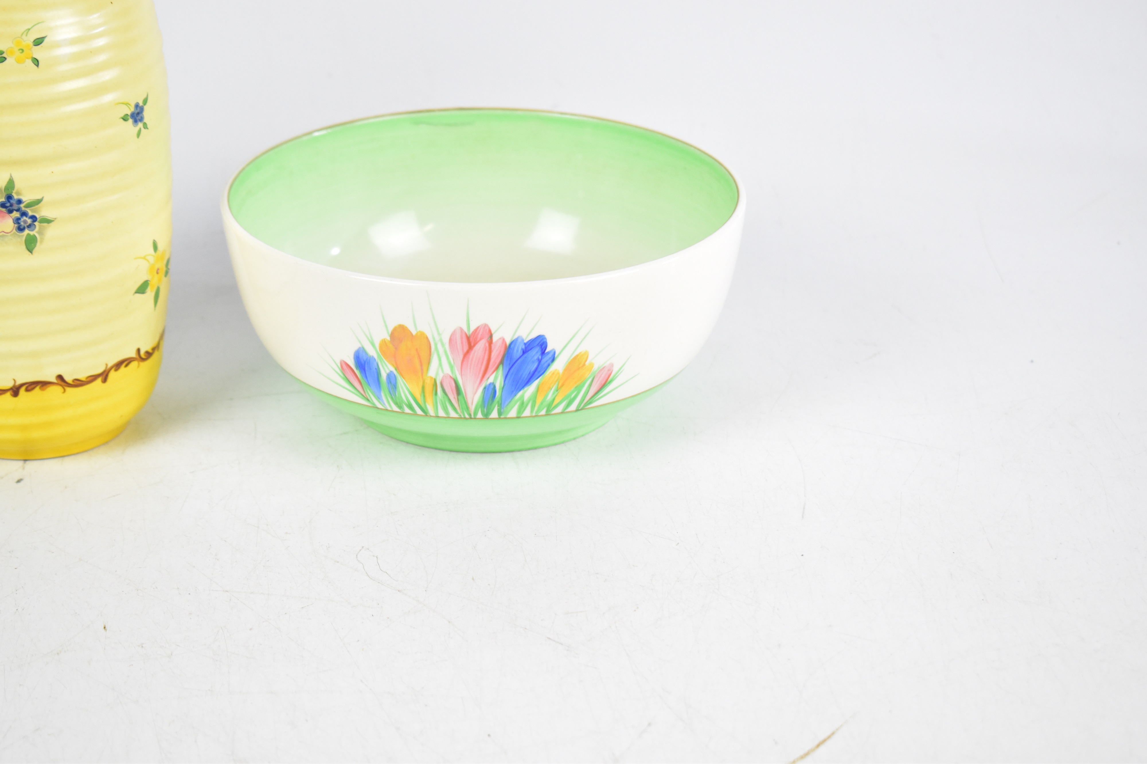 Lot 371 - CLARICE CLIFF; a ribbed jug decorated in the