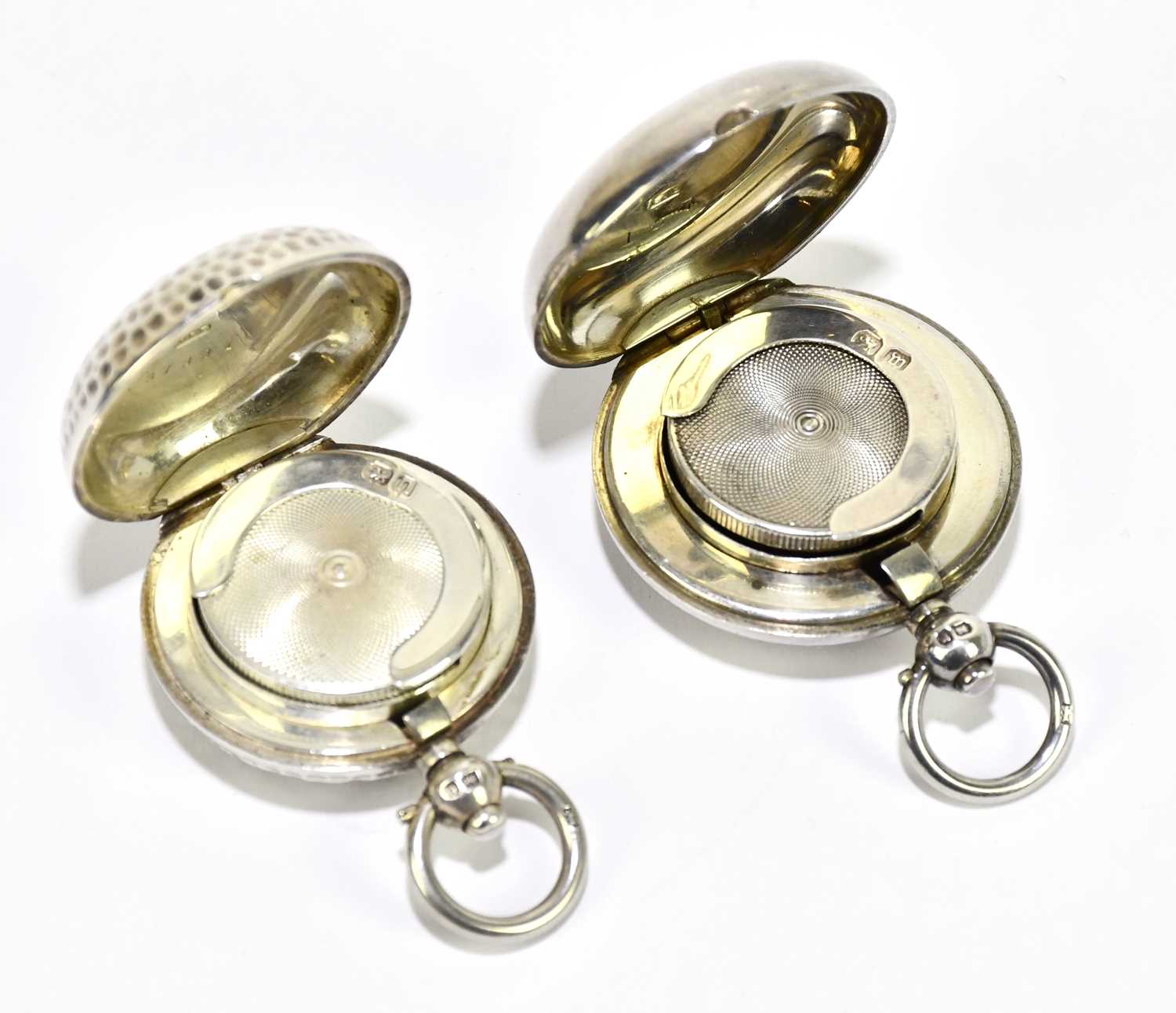 Lot 2404 - Two hallmarked silver sovereign cases, one