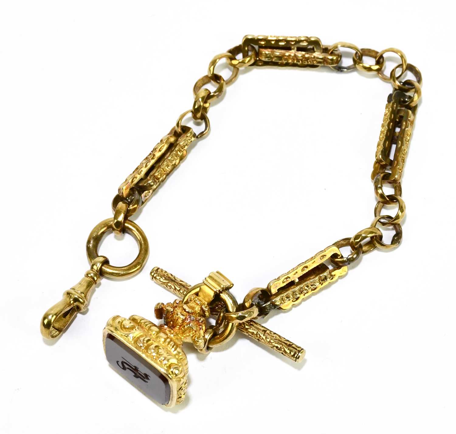 Lot 1840 - A gilt metal Albert chain, with textured