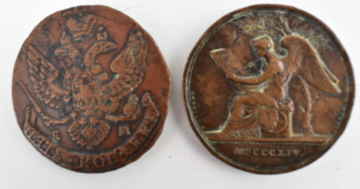 Lot 542 - A Napoleonic 1814 bronze medal for the Tzar