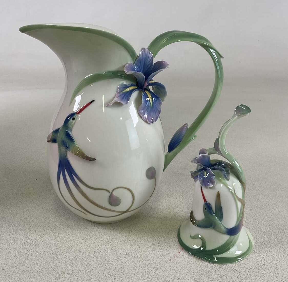 Lot 193 - FRANZ PORCELAIN; hummingbird jug, height