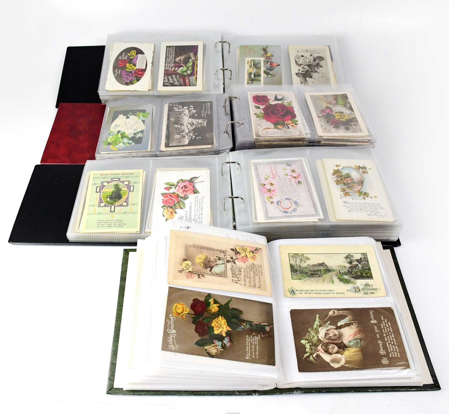 Lot 764 - Four postcard albums containing