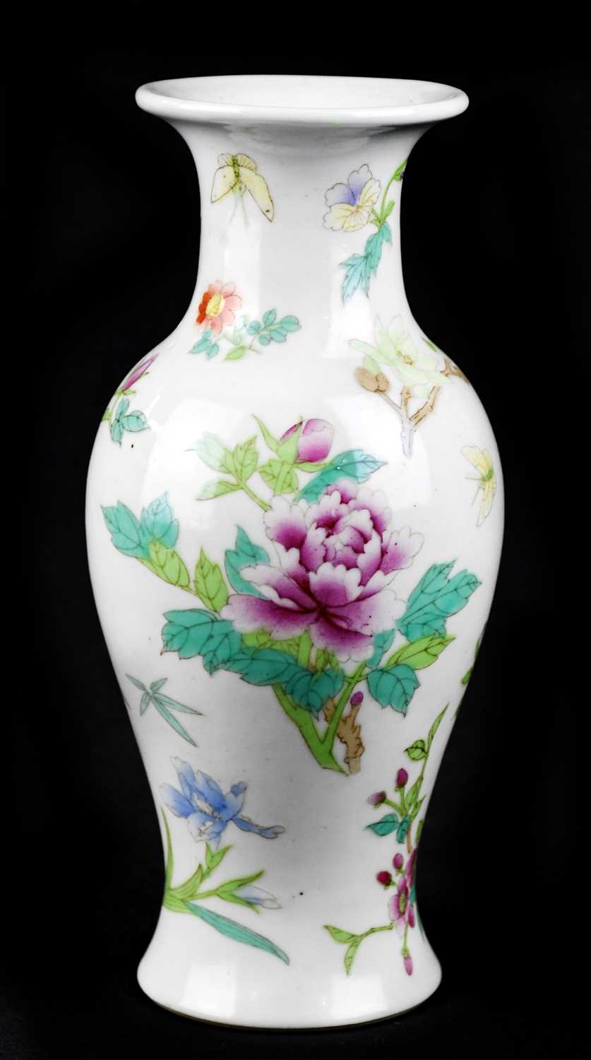 Lot 2061 - A Famille Rose pattern vase, height 20cm.