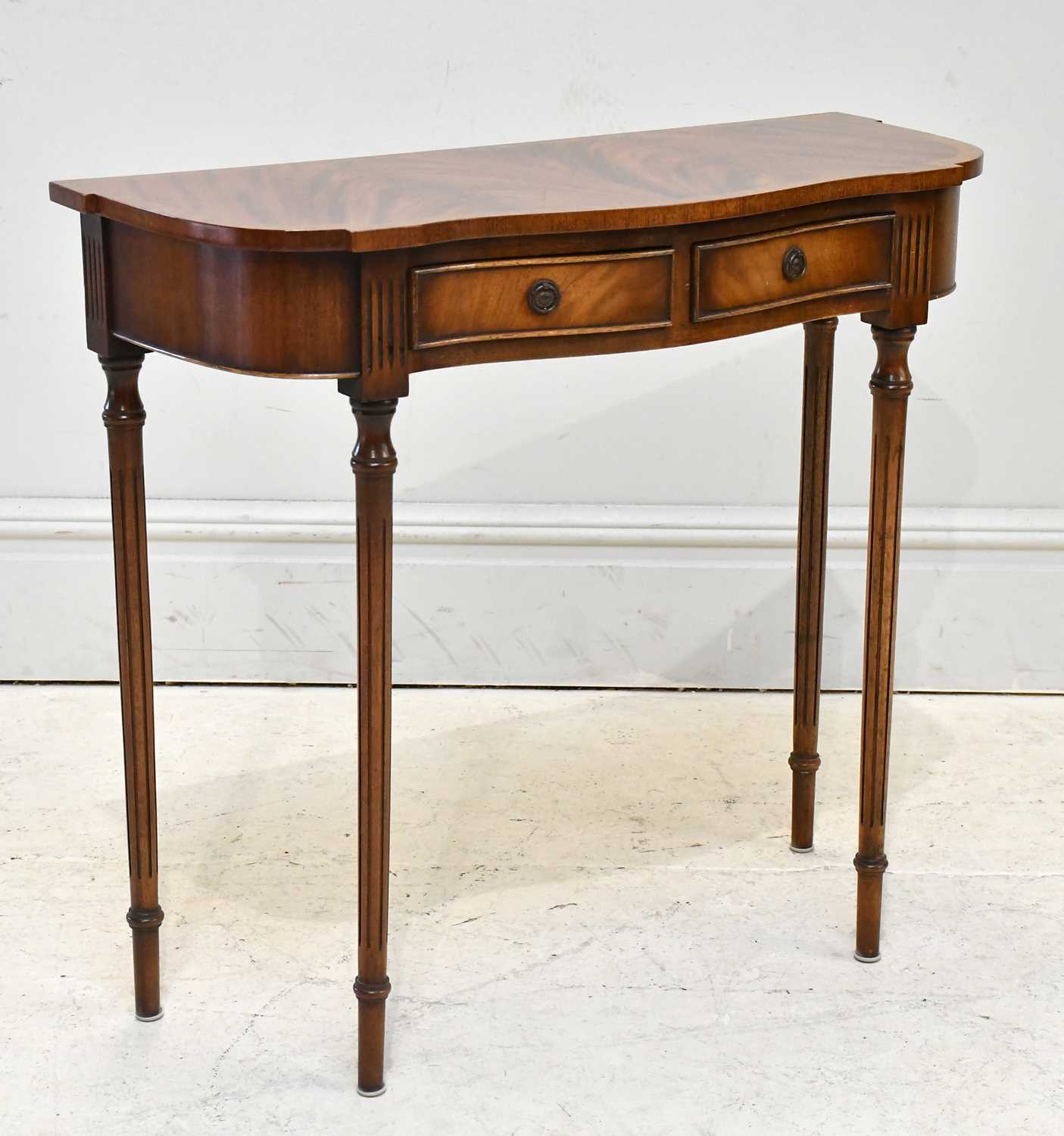 Lot 81 - A reproduction two drawer hall table, height