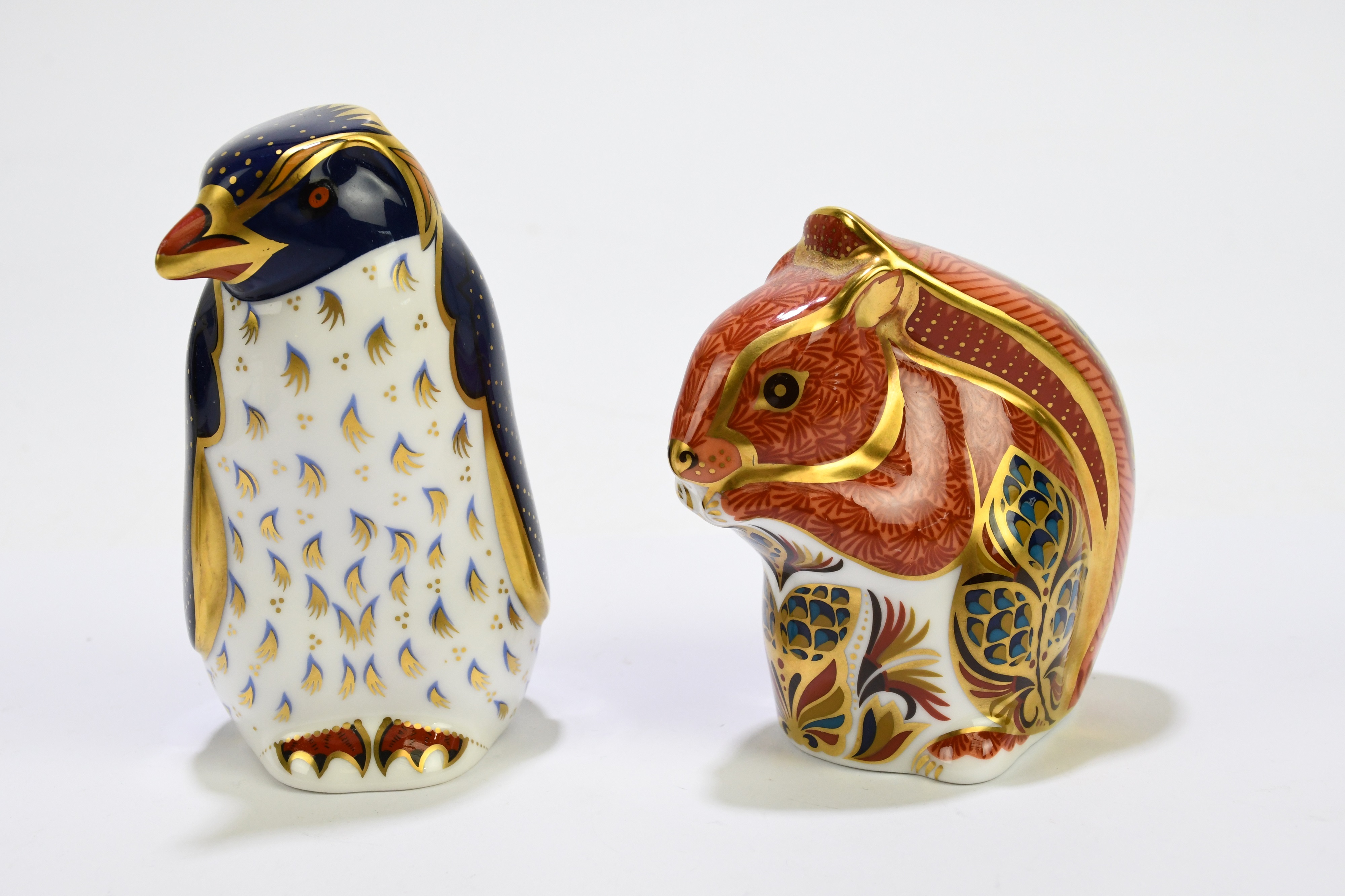 Lot 666 - ROYAL CROWN DERBY; three animal paperweights