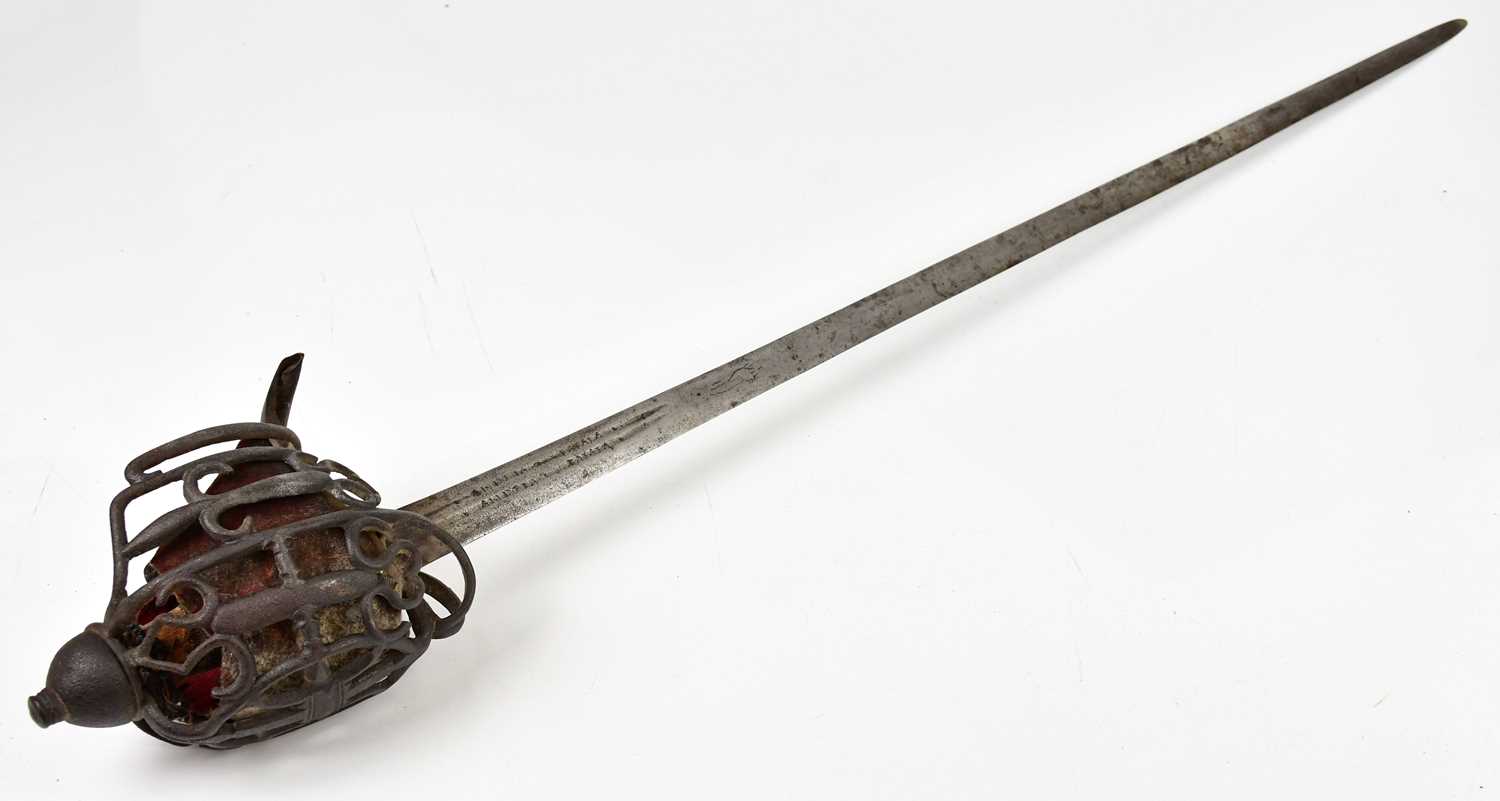 Lot 664 - A basket hilt broad sword, with shagreen