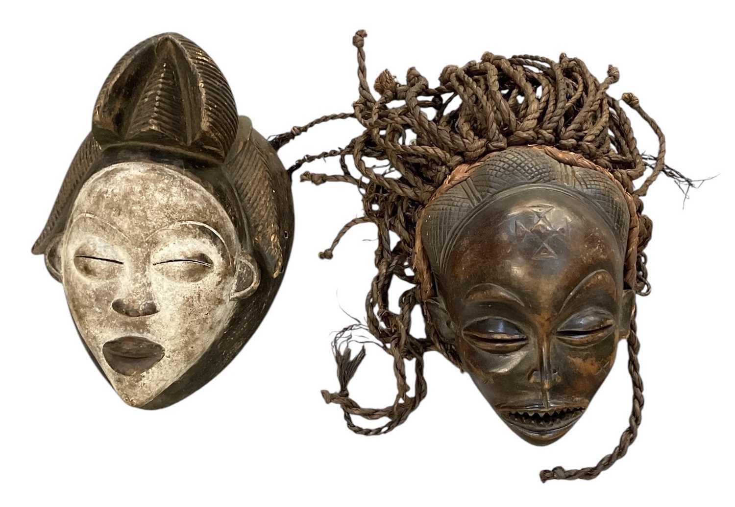 Lot 1014 - Two African carved wooden tribal masks,