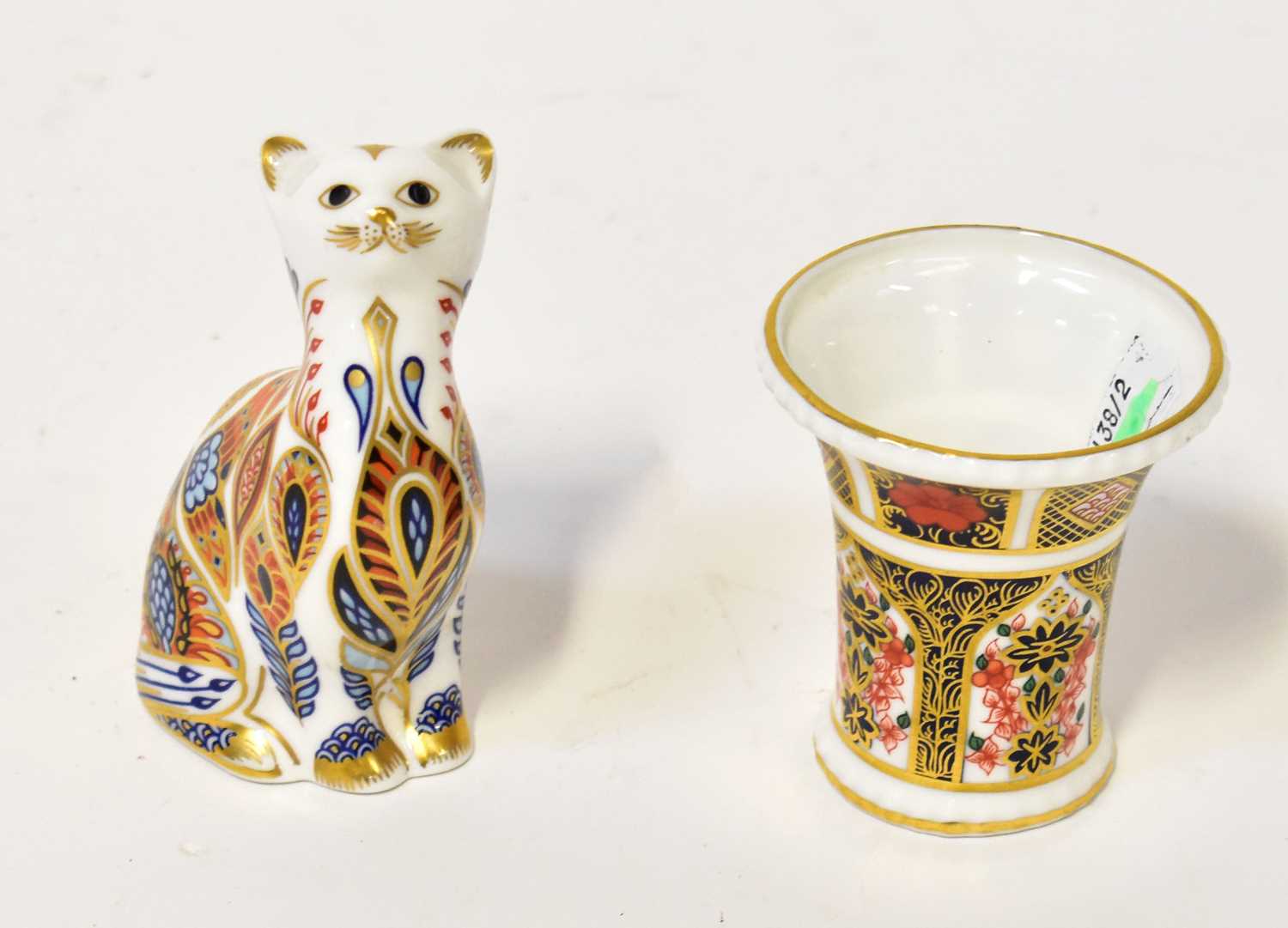 Lot 142 - ROYAL CROWN DERBY; a paperweight in the form